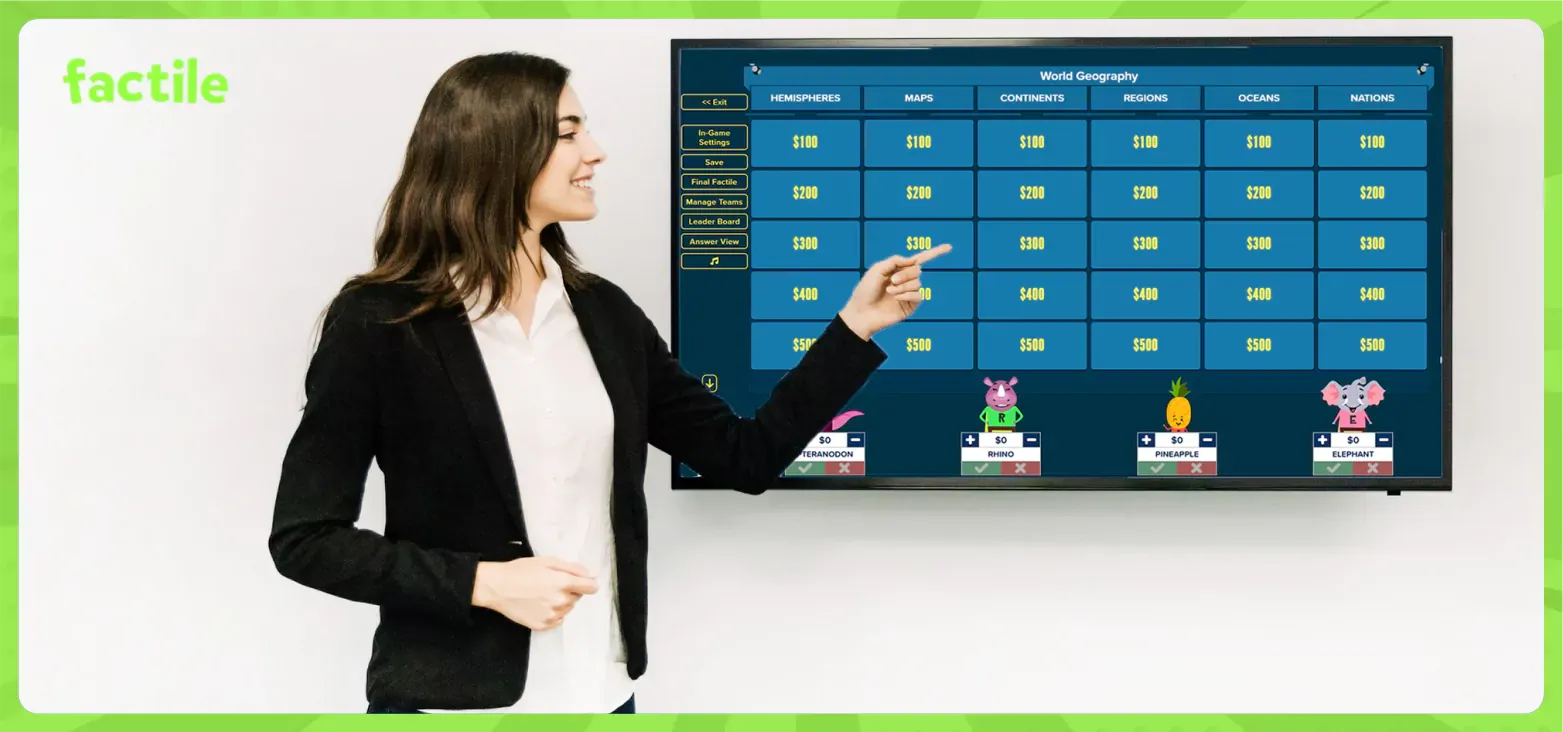 Woman points at a Jeopardy-style game board on a screen in a classroom ...